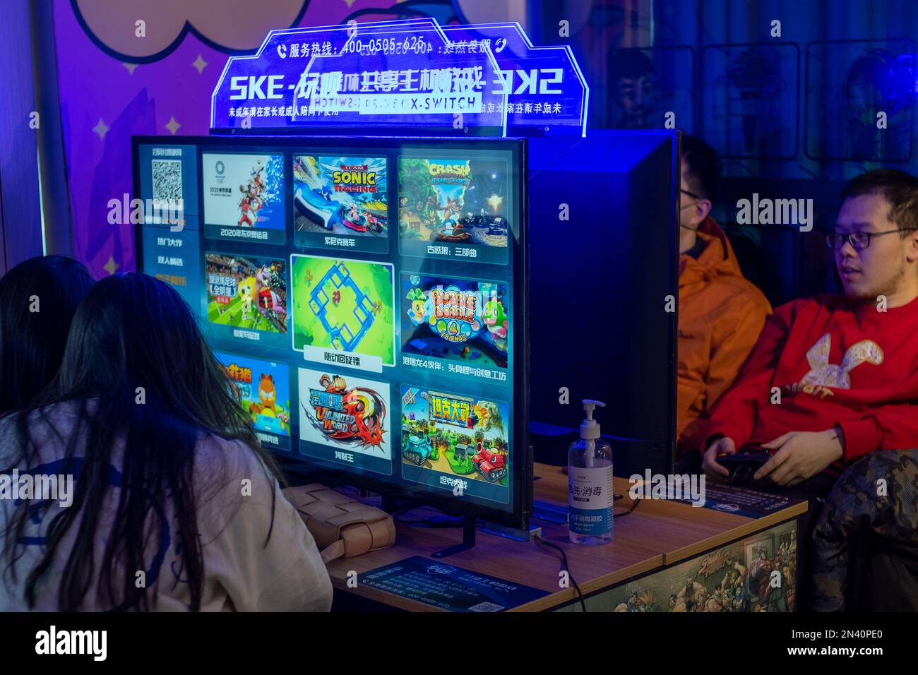 Young people play video games in a shopping mall in Beijing, China. 08 ...