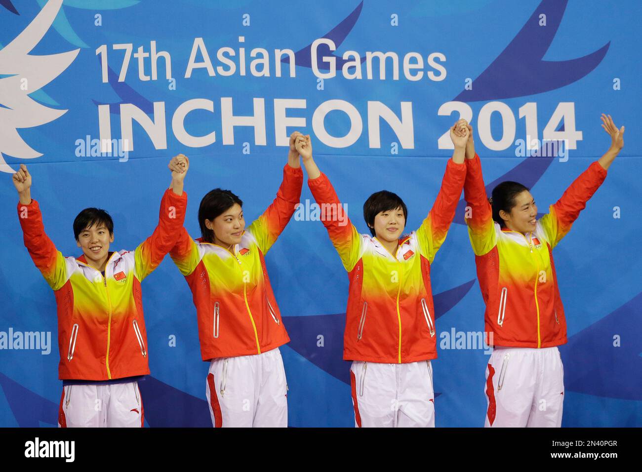 China's women's 4x200-meter freestyle relay team from left, Guo Junjun ...