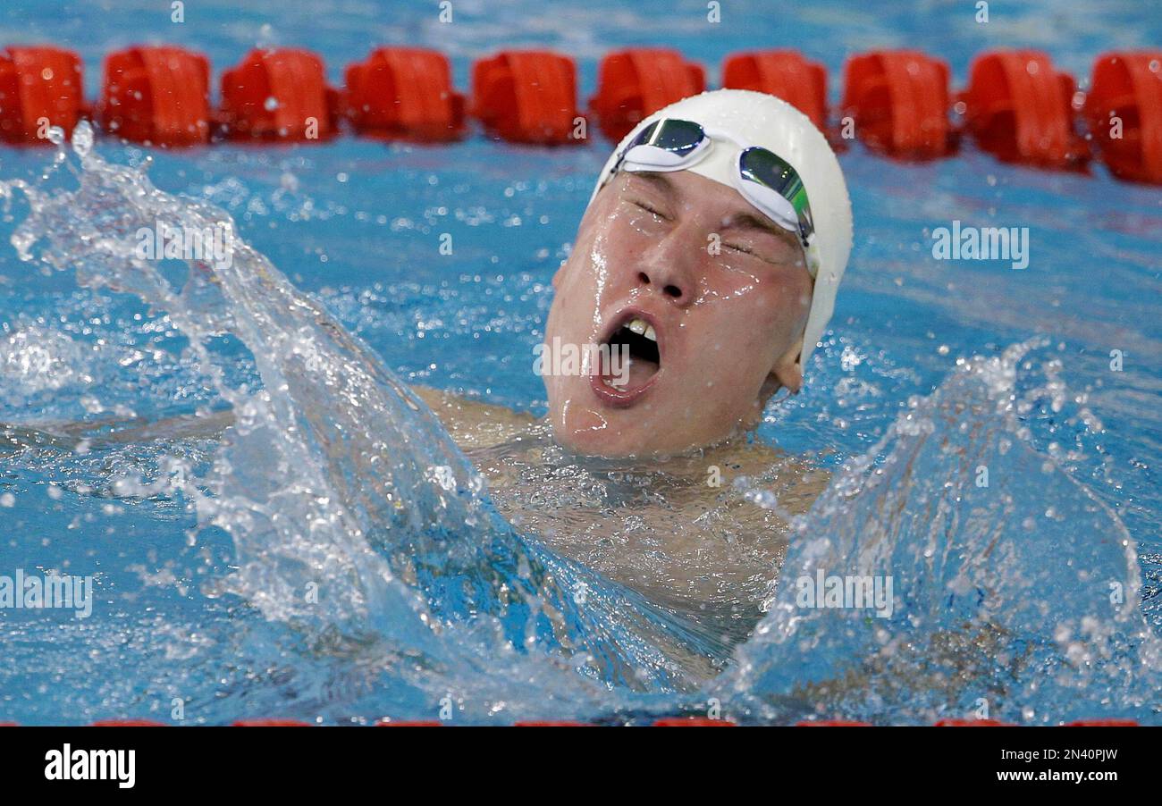 Kazakhstan's Dmitriy Balandin celebrates after winning the men's 200 ...