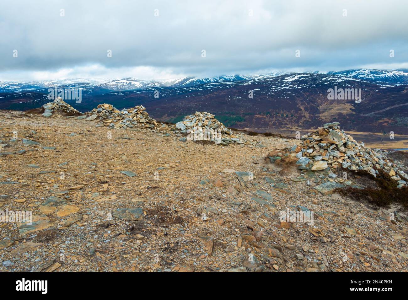 The 5 cairns on the path up to the Corbett mountain of Morrone, or ...