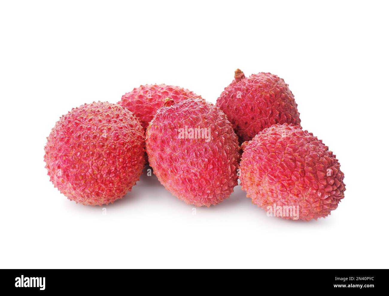 Pile of fresh ripe lychees on white background Stock Photo - Alamy