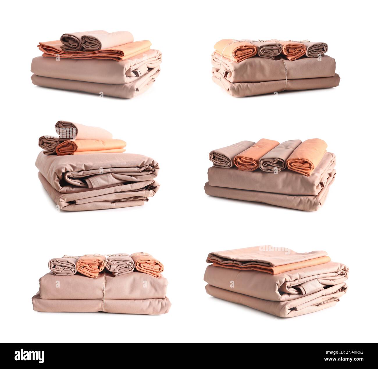 Set with stacks of clean bed linen on white background Stock Photo - Alamy