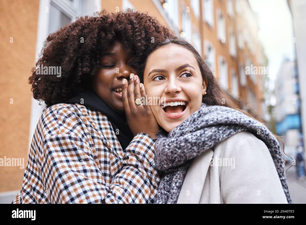 Woman, friends and gossip in the city whispering in the ears for secret ...