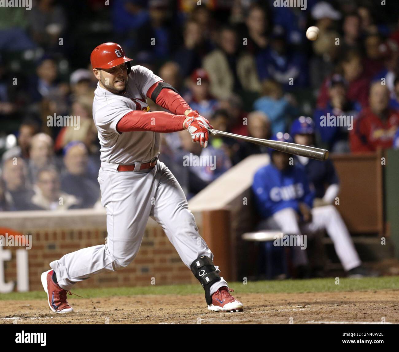 St. Louis Cardinals' Matt Holliday hits an RBI single off Chicago Cubs ...