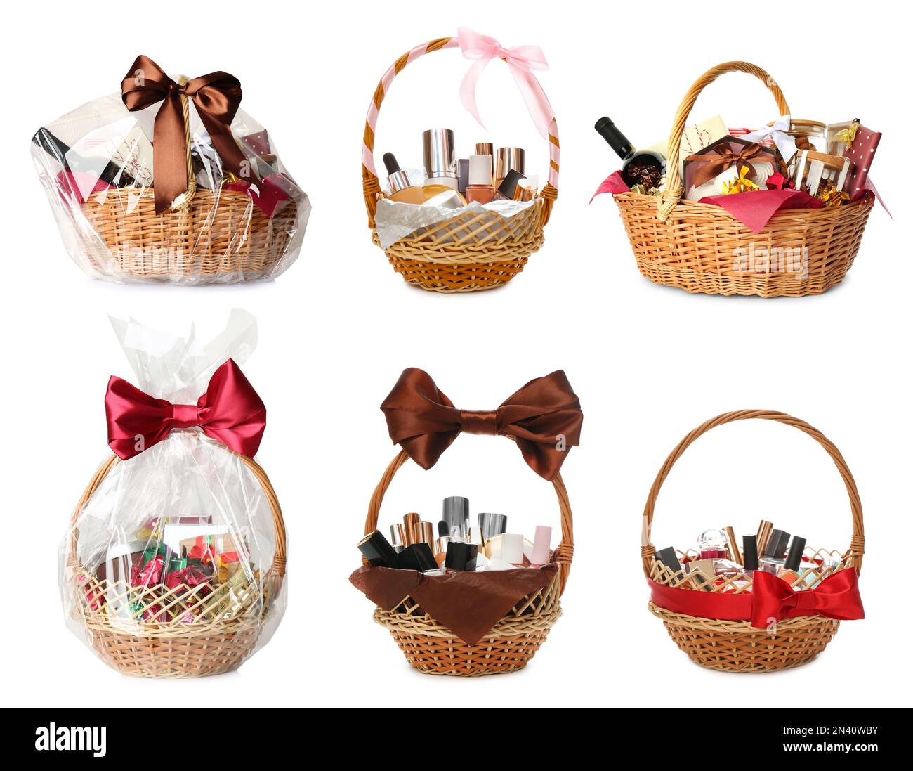 Set with wicker baskets full of different gifts on white background ...