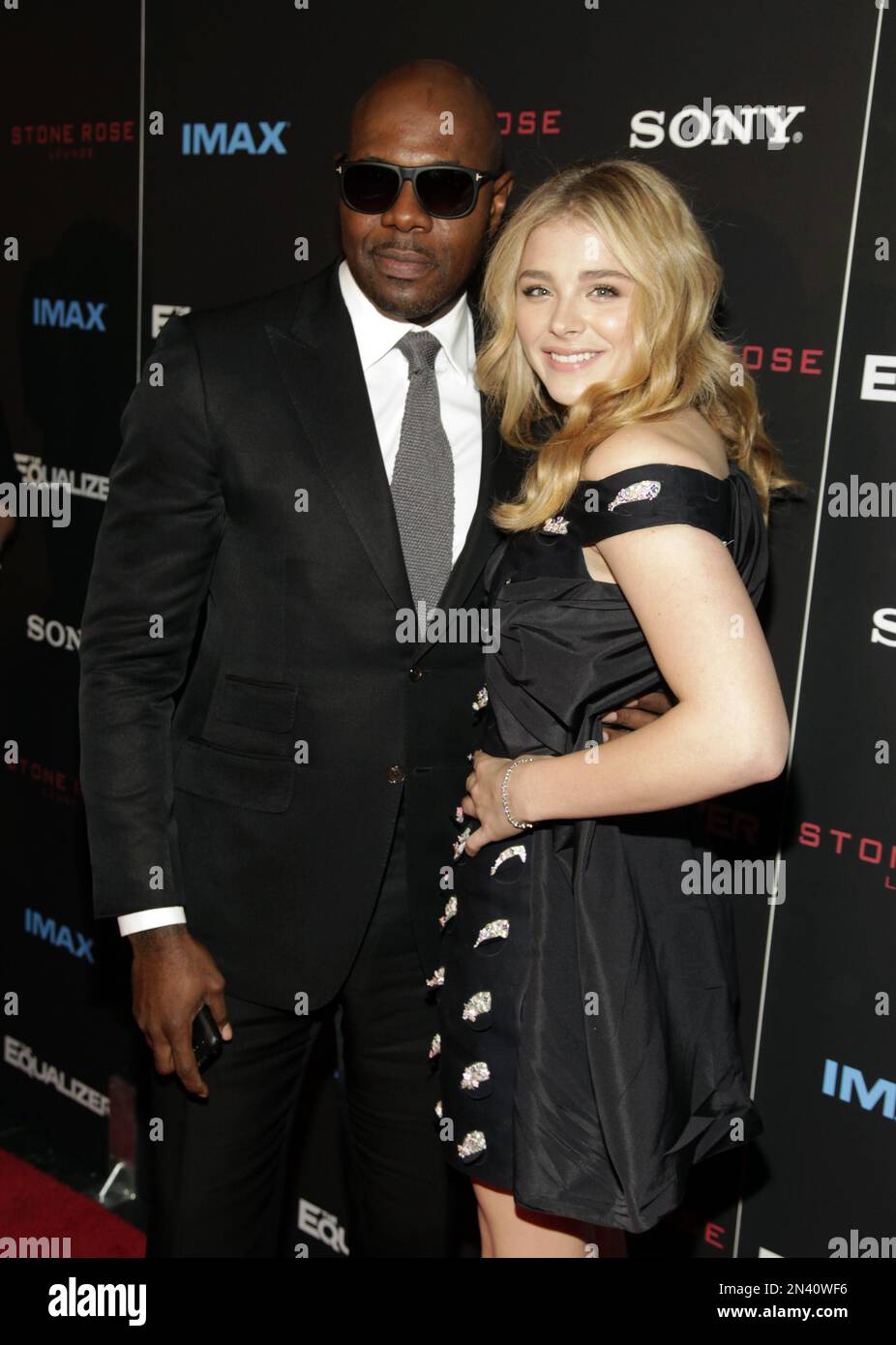 Antoine Fuqua, left, and Chloë Grace Moretz, right, attend a screening ...