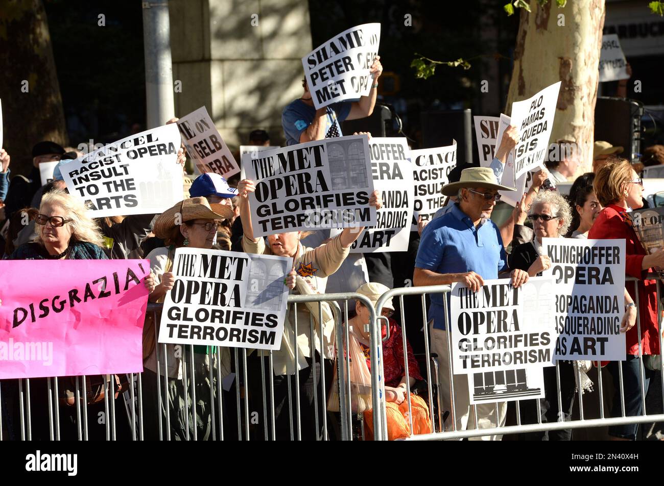 Protestors attend the arrivals at Metropolitan Opera 2014-15 Season ...
