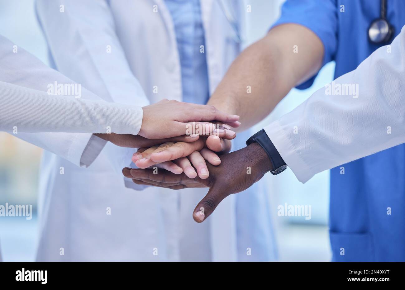 Healthcare, teamwork and hands together in huddle for team building, collaboration and ...