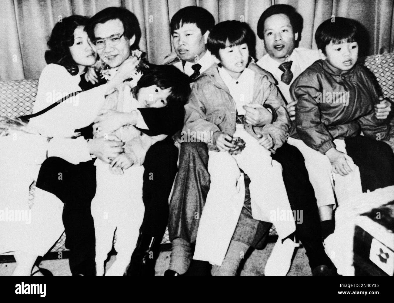 Dr. Haing S. Ngor, secong from left, poses with his niece Mrs. Dom ...