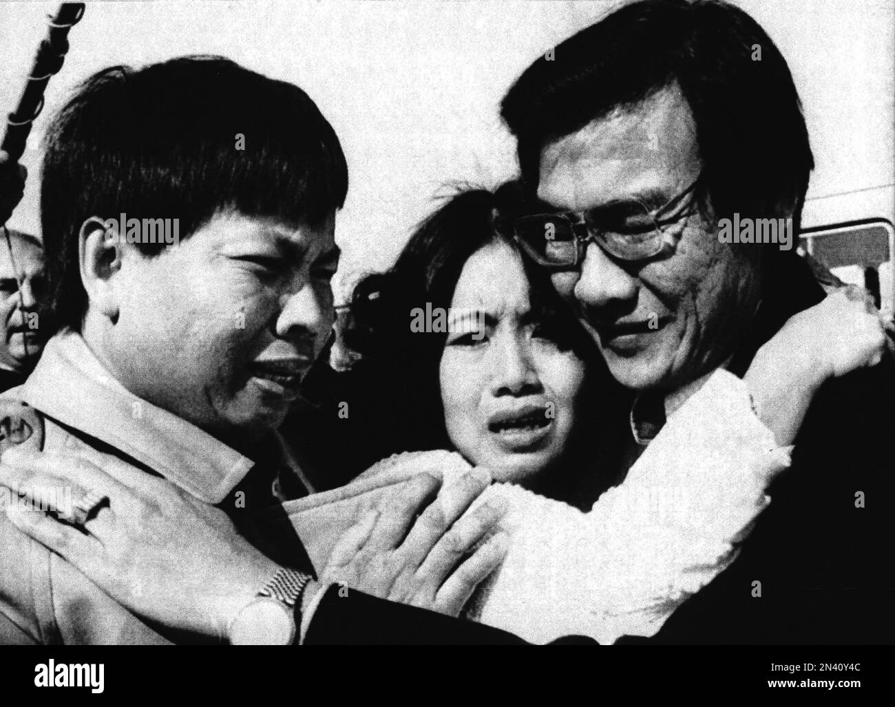 Dr. Haign S. Ngor, right, is overcome with emotion as he hugs his niece ...