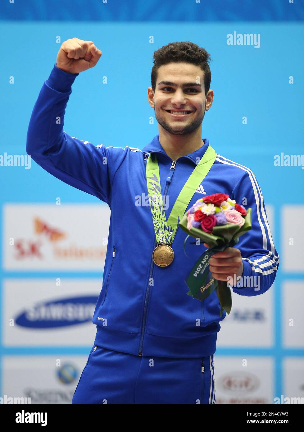 Iraq's Karrar Mohammed Jawad Mohammed Kadhum celebrates his bronze ...
