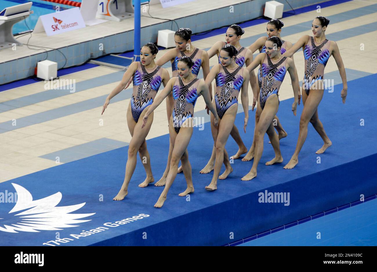 Chinese team members compete during their synchronized swimming team ...