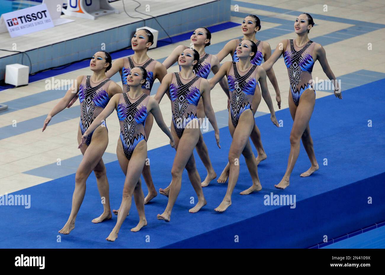 Chinese team members arrive for their synchronized swimming team free ...