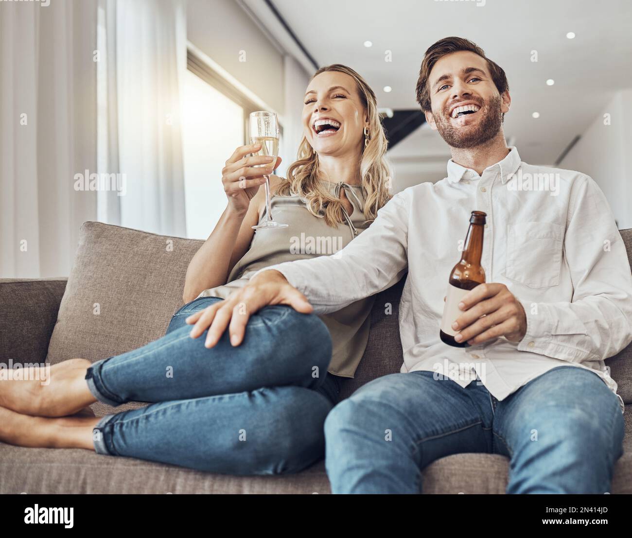 Couple relax with alcohol drink, watching tv and funny with quality ...