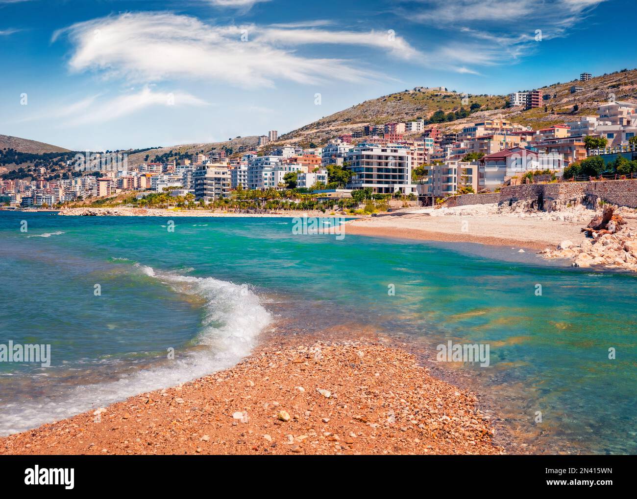 Azure river flowing in the sea. Splendid spring cityscape of Saranda ...