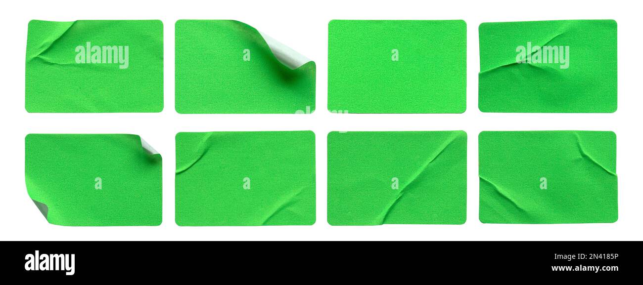 A set of green rectangular paper sticker label isolated on white ...