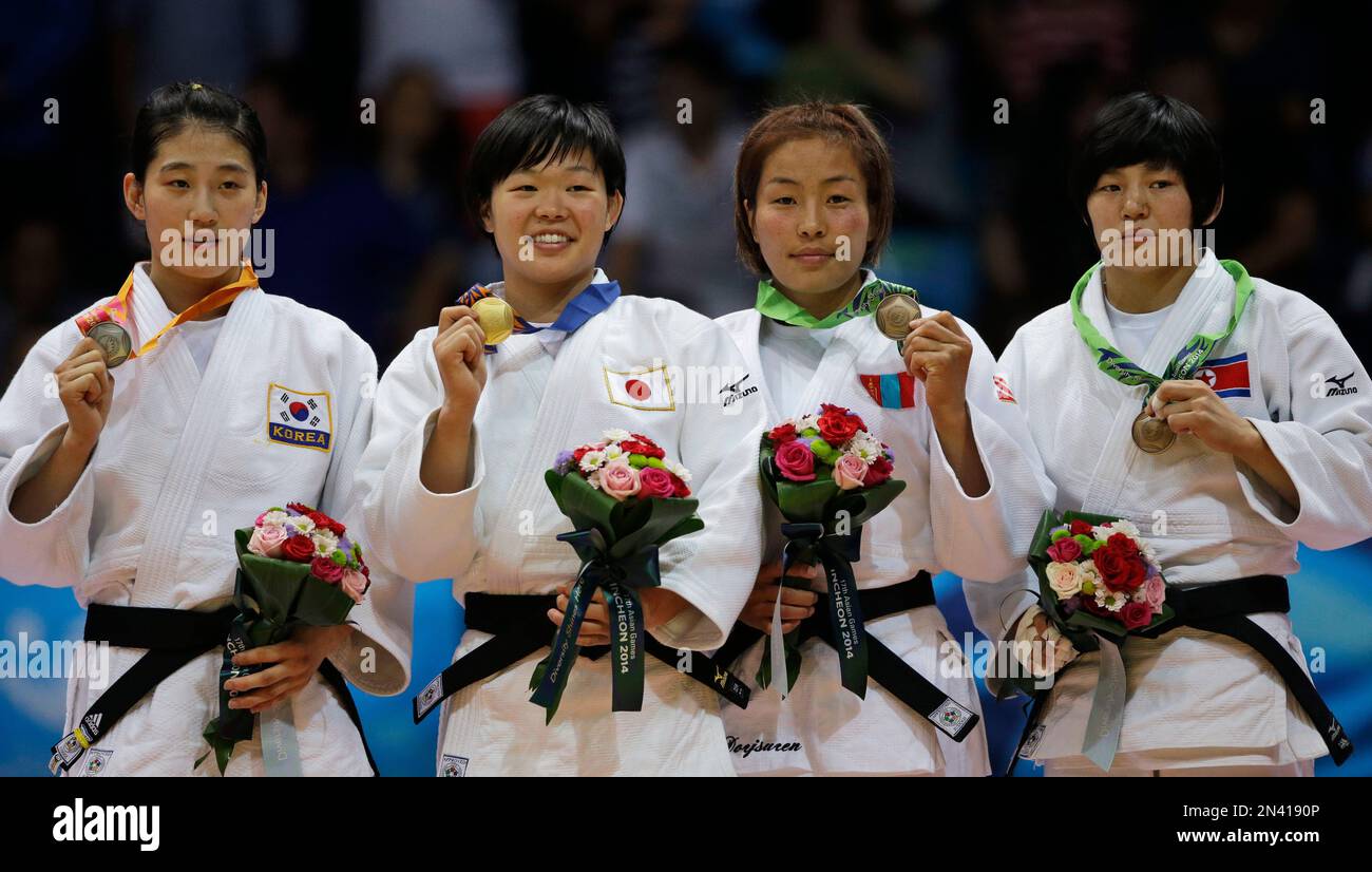 From left to right, silver medallist South Korea's Kim Jan-di, gold ...