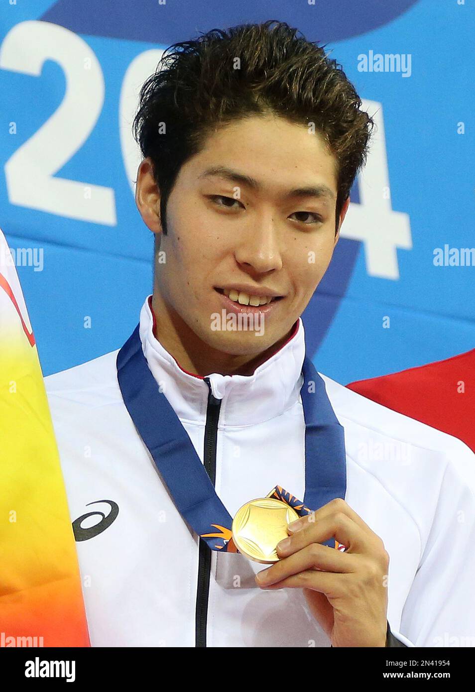 Japan's Kosuke Hagino celebrates on the podium after receiving his gold ...