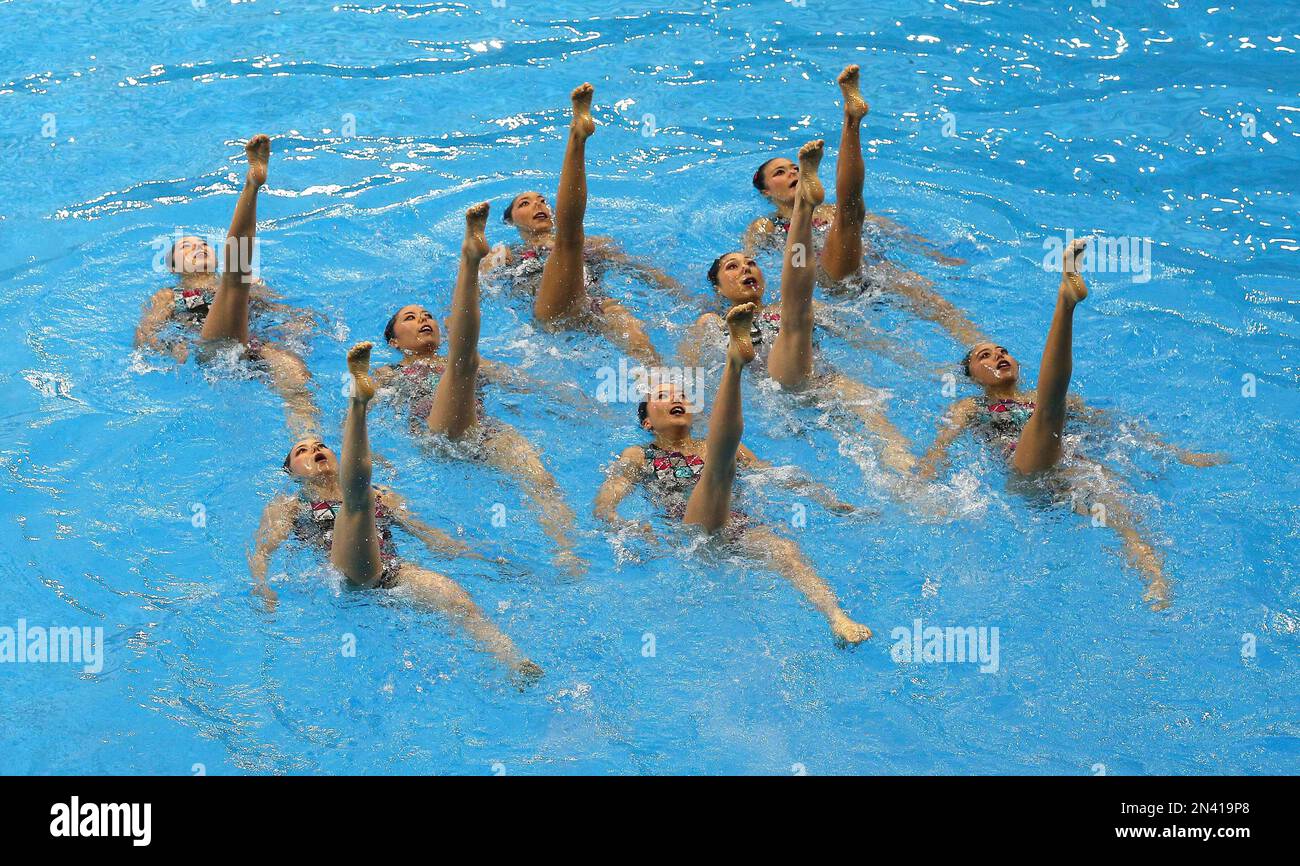Japan's synchronized swimming team perform their technical routine at ...