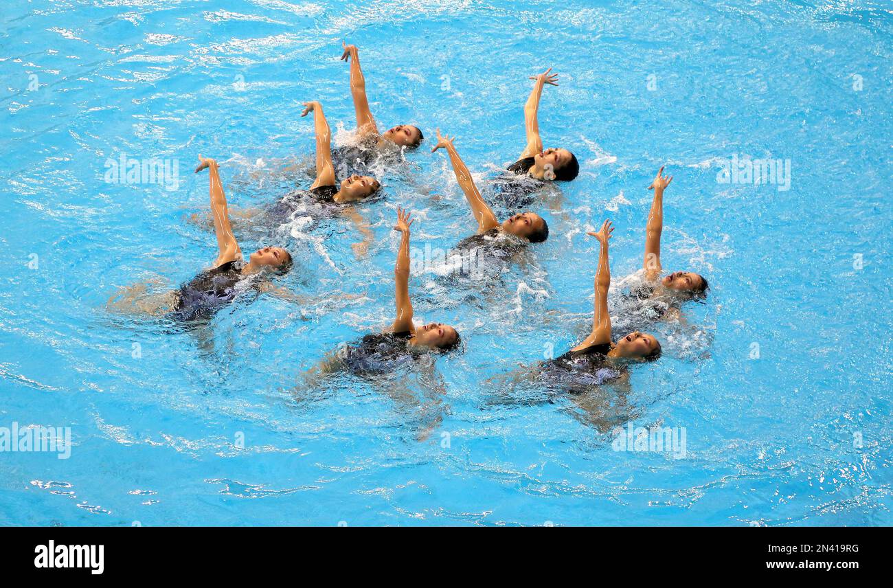 Hong Kong's synchronized swimming team perform their technical routine ...