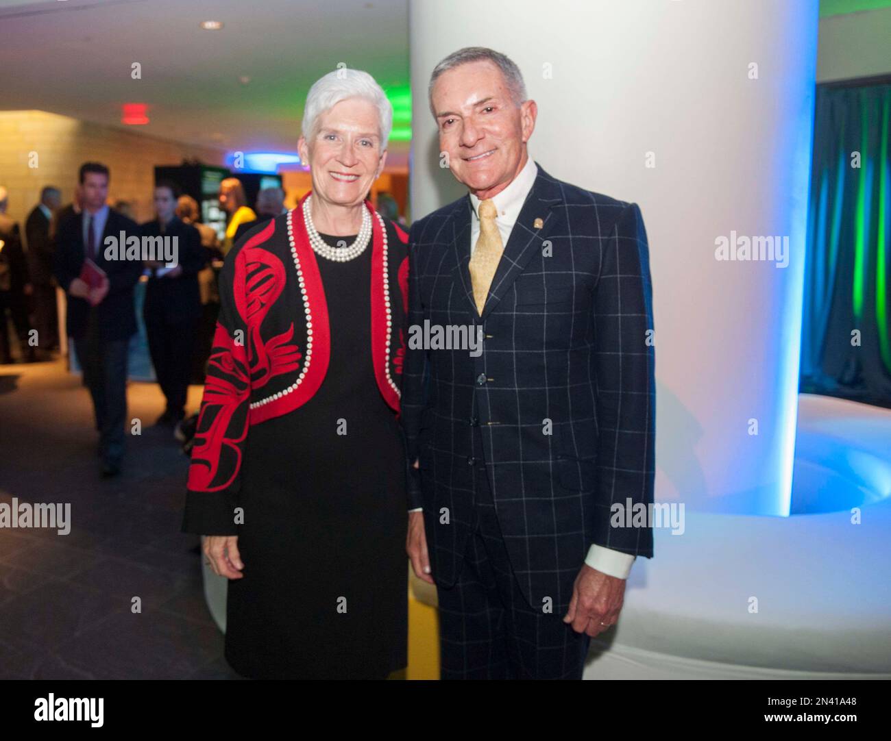 Mary Beth West and W. Richard West pose for a photo during the ...