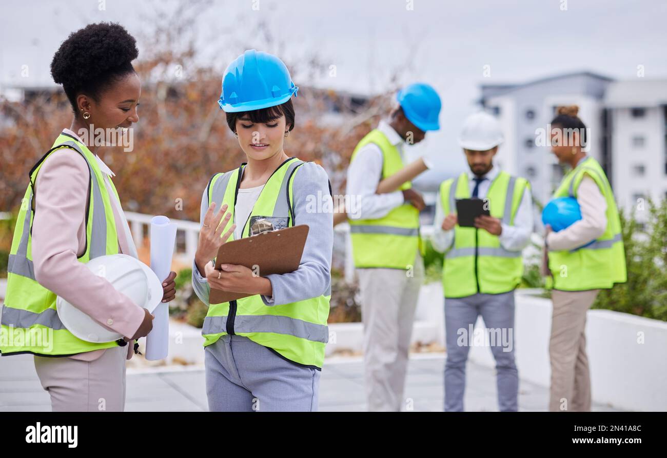 Industry, inspection and construction team with a clipboard for a ...