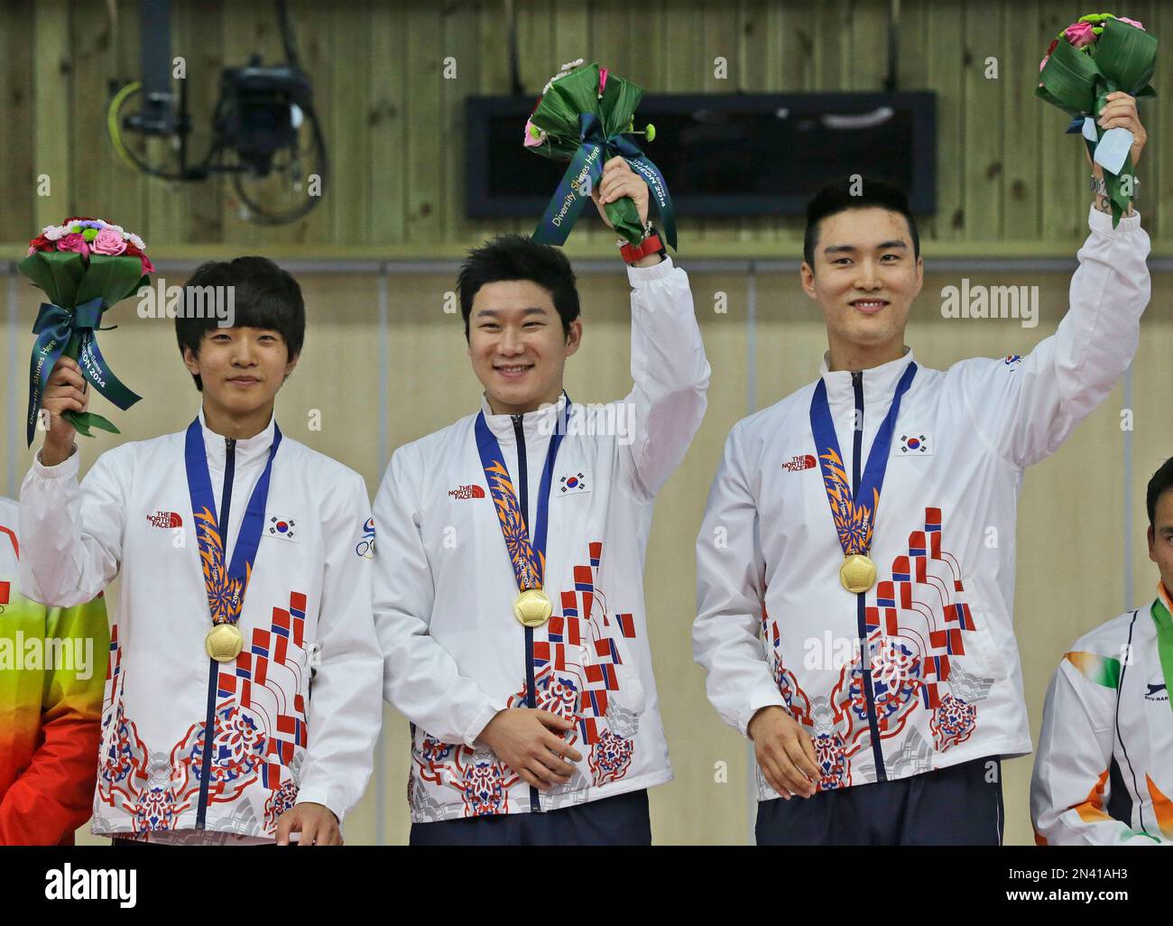 Gold medalists, from left to right, Kim Cheong-yong, Jin Jong-oh and ...