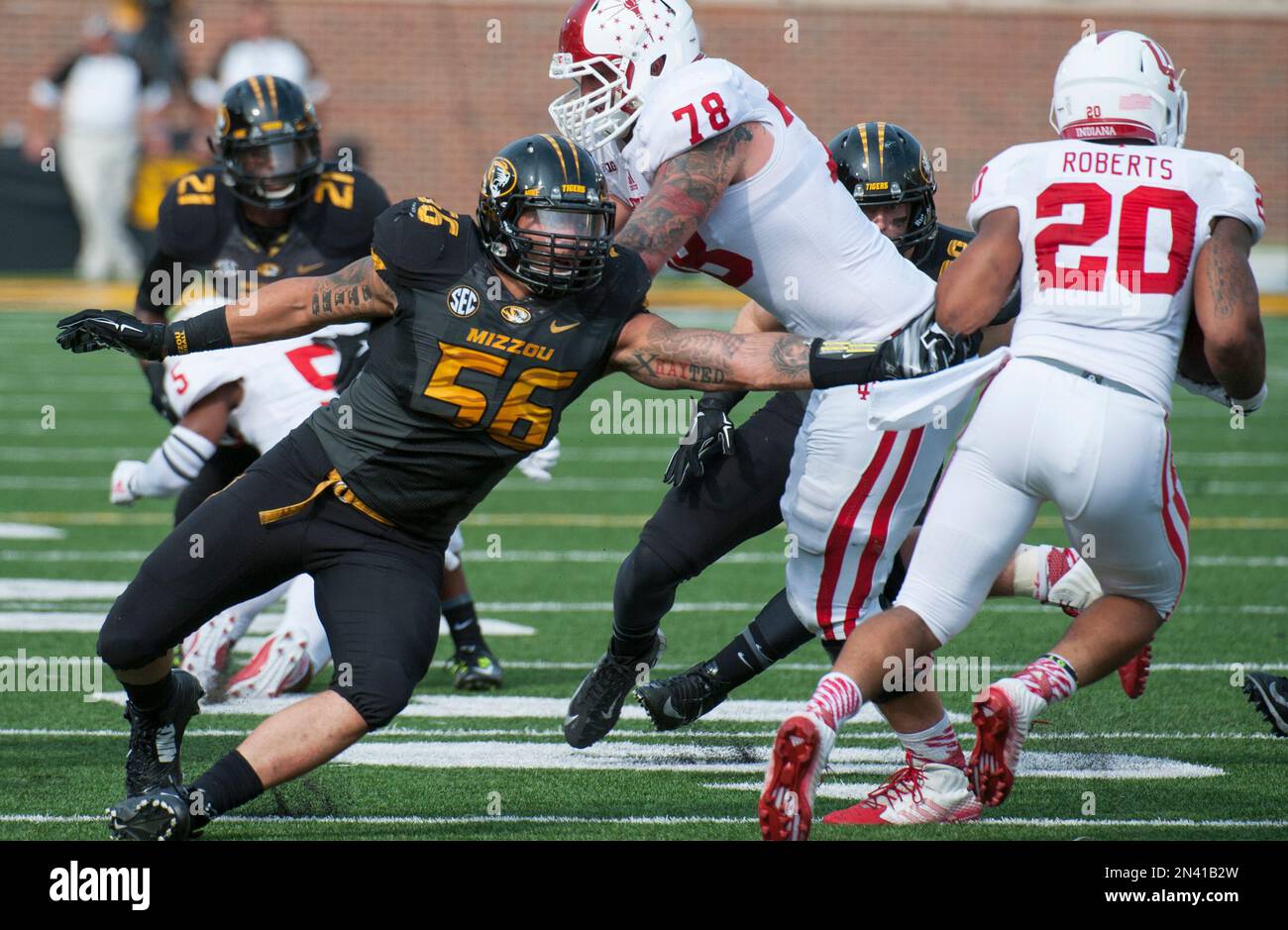 Missouri's Shane Ray, left, tries to tackler Indiana running back D ...
