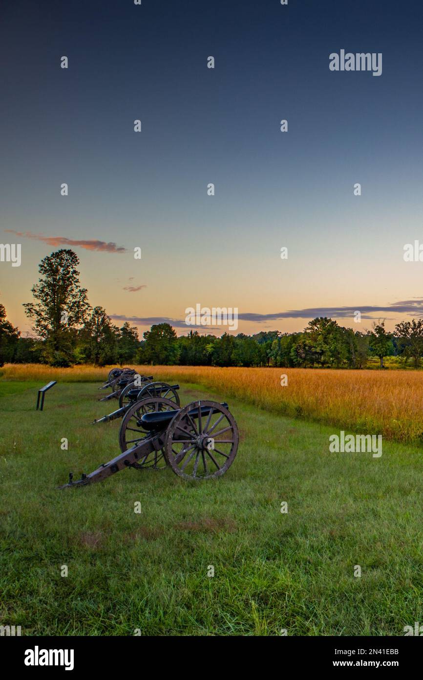 A vertical shot of agricultural land and sled on a greenfield during ...