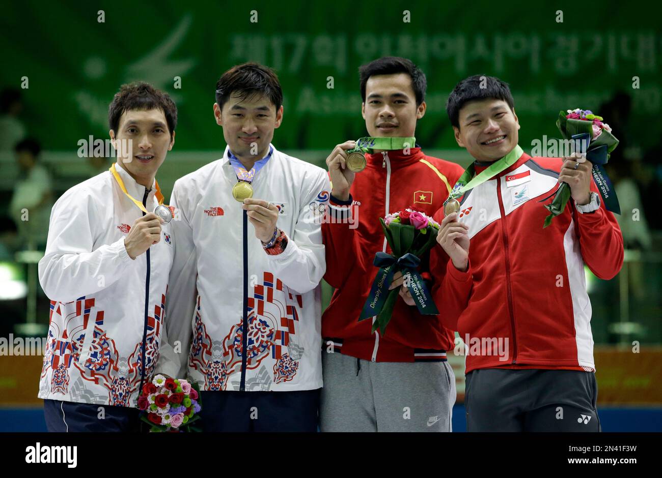 Gold medalist South Korea's Jung Jin-sun, second from left, silver medalist South Korea's Park ...