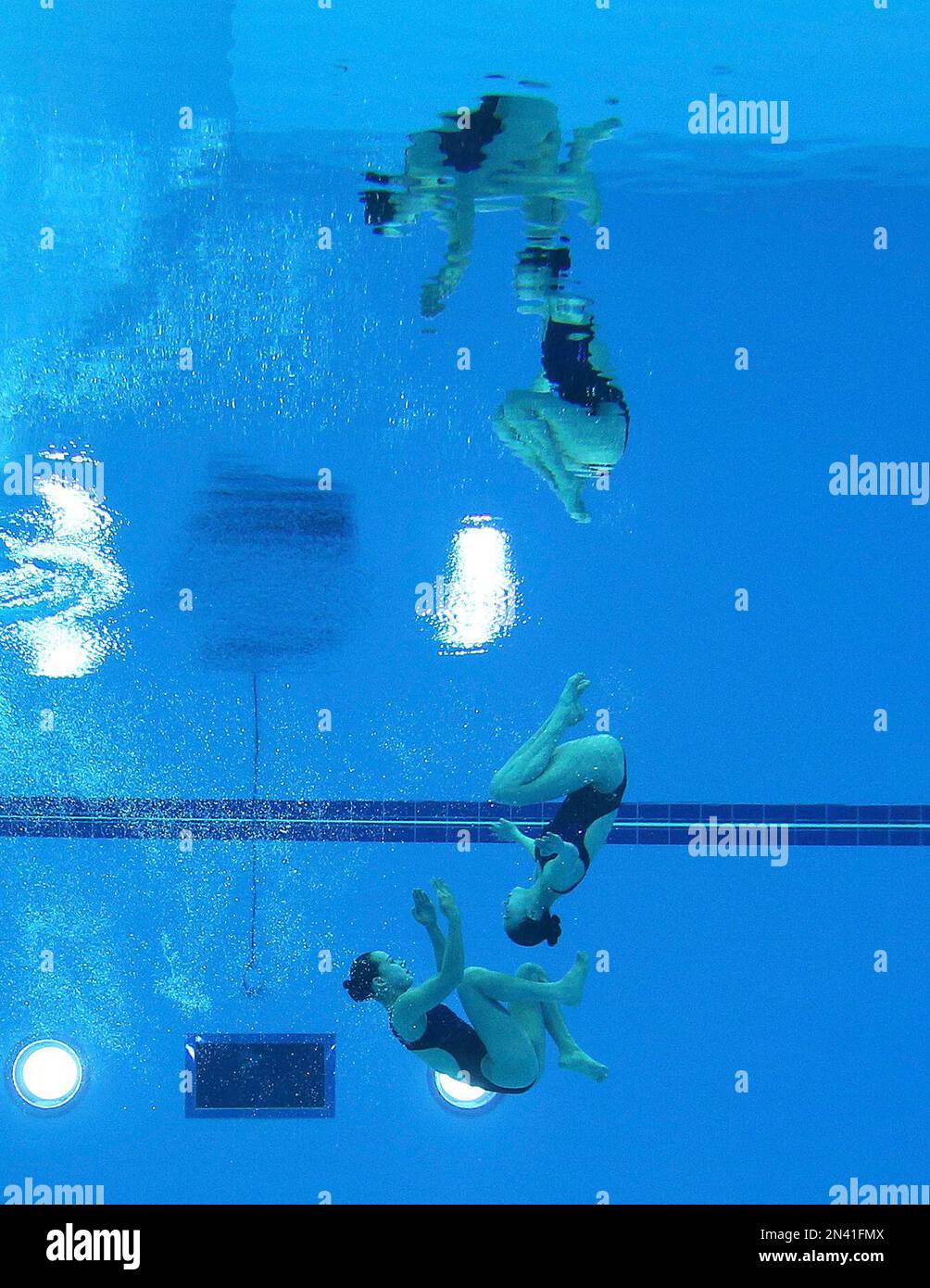 North Korea's Kim Jonghui and Ri Jihyang perform in the pool during ...