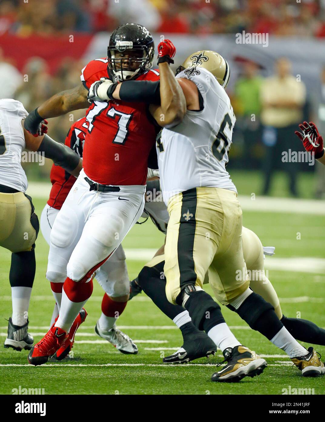 Atlanta Falcons defensive end Ra'Shede Hageman (77) tries to get past ...