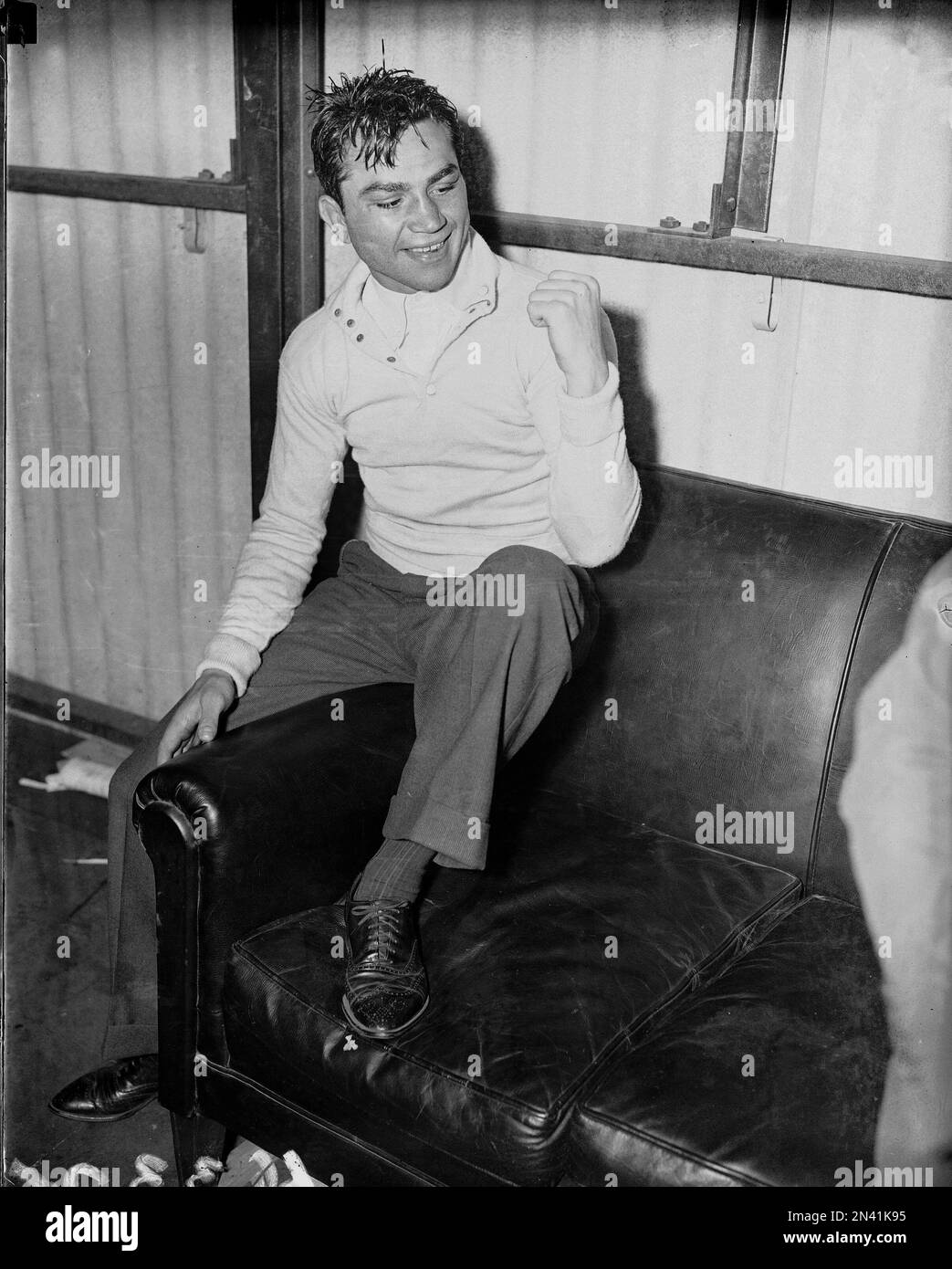 Barney Ross, the new welterweight champion of the world, is pictured ...