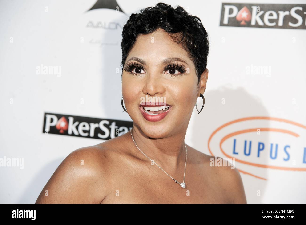 Toni Braxton arrives at the 6th Annual Get Lucky For Lupus Poker ...