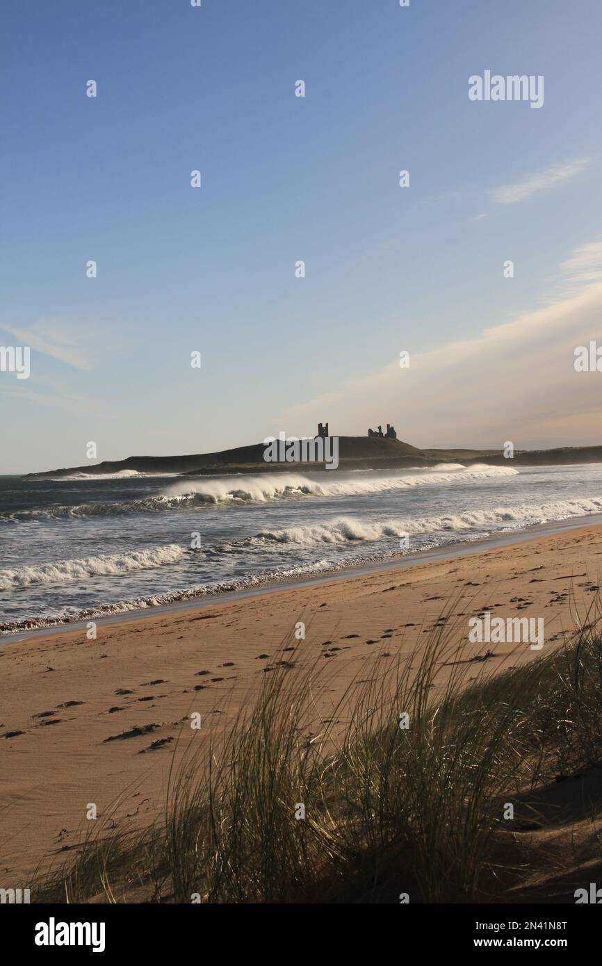 Dunstanburgh Castle from Embleton Beach Stock Photo - Alamy