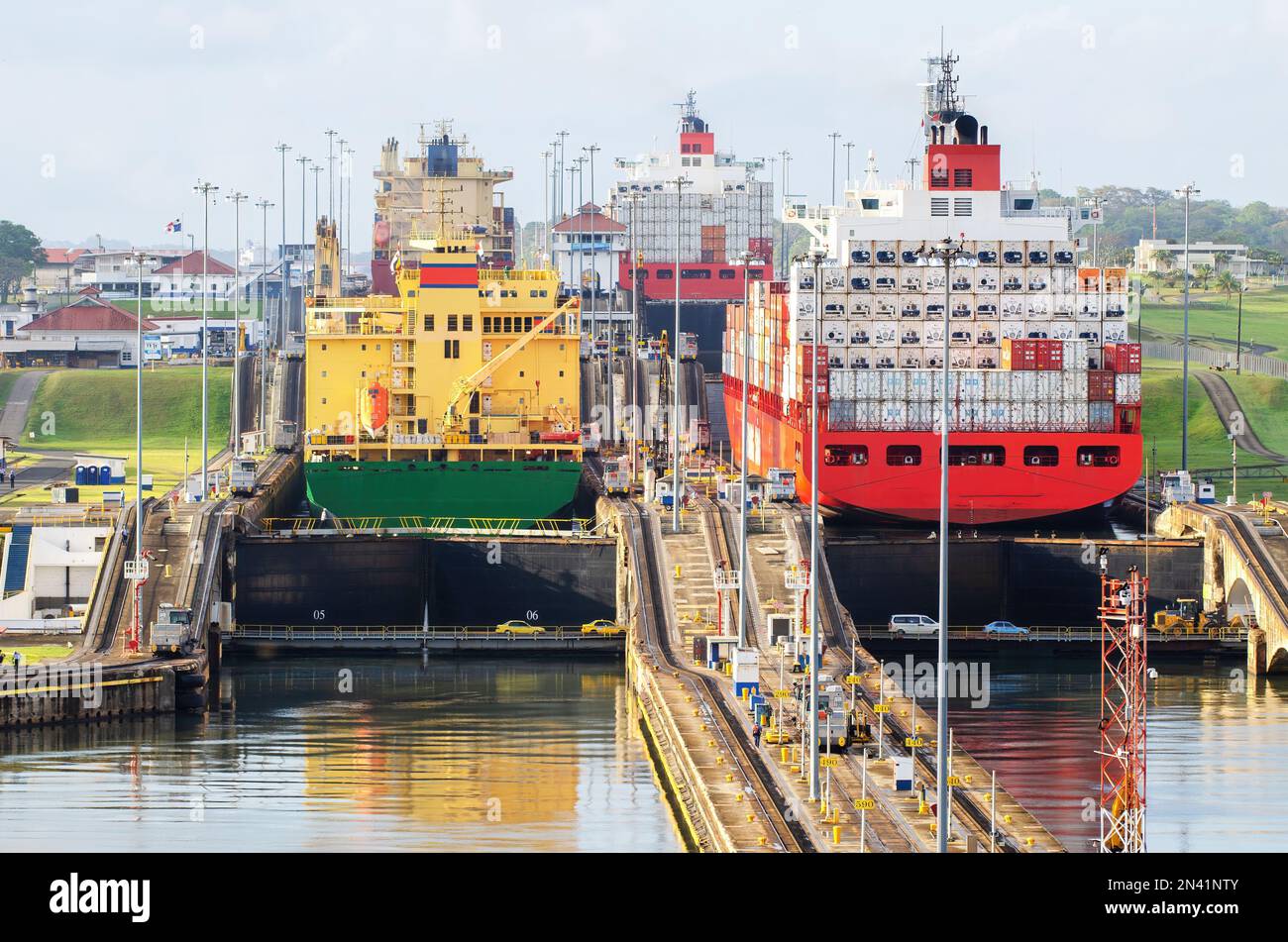 Two cargo ship transiting the Miraflores locks in the Panama Canal ...