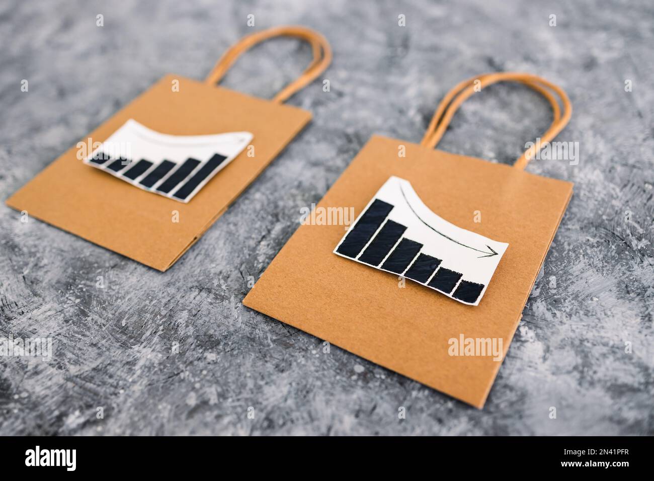 when will inflation go down. shopping bags with graph showing prices ...