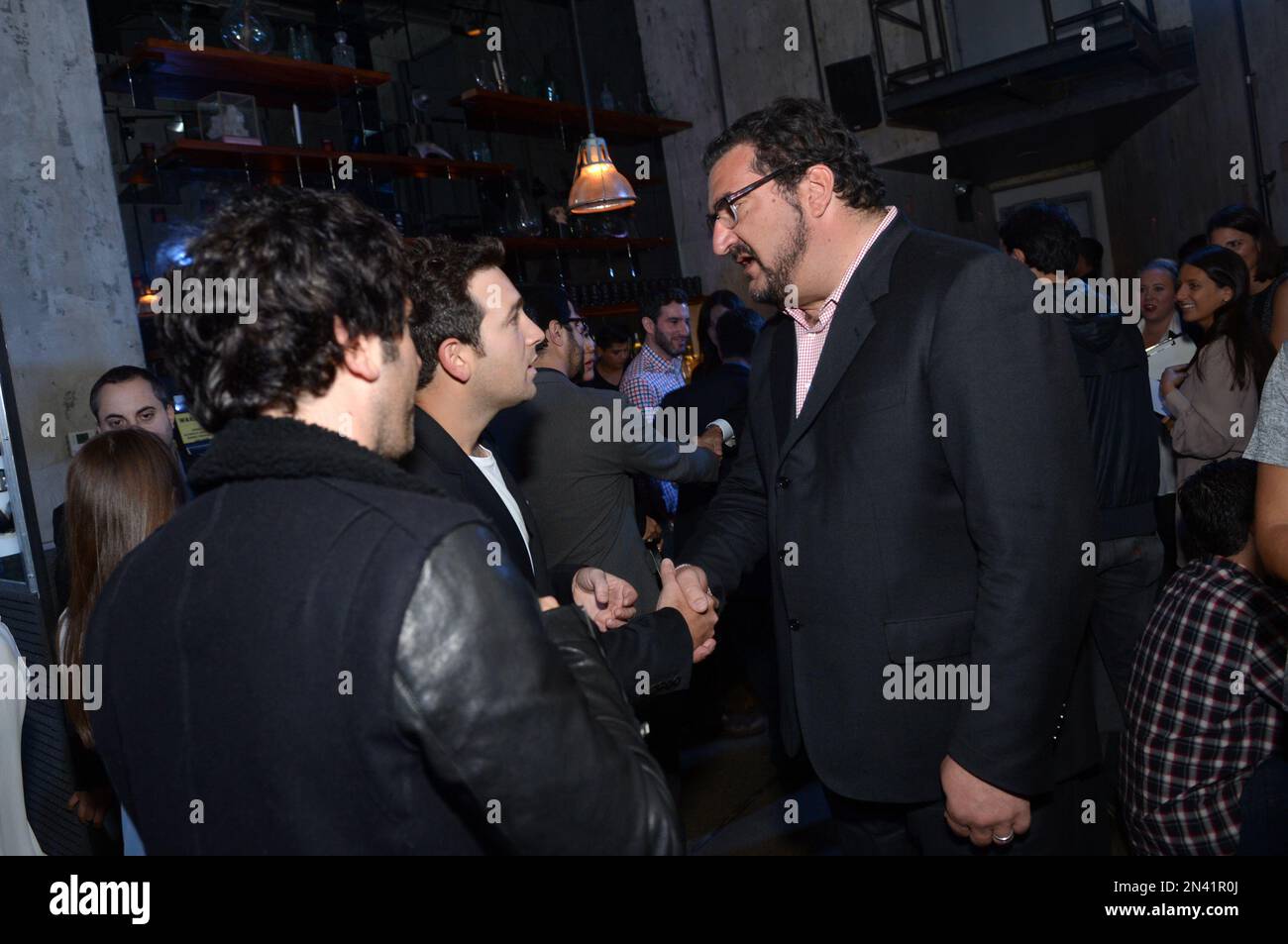 From left, President and Head of A&R at SONGS Ron Perry, Jeffrey Azoff ...