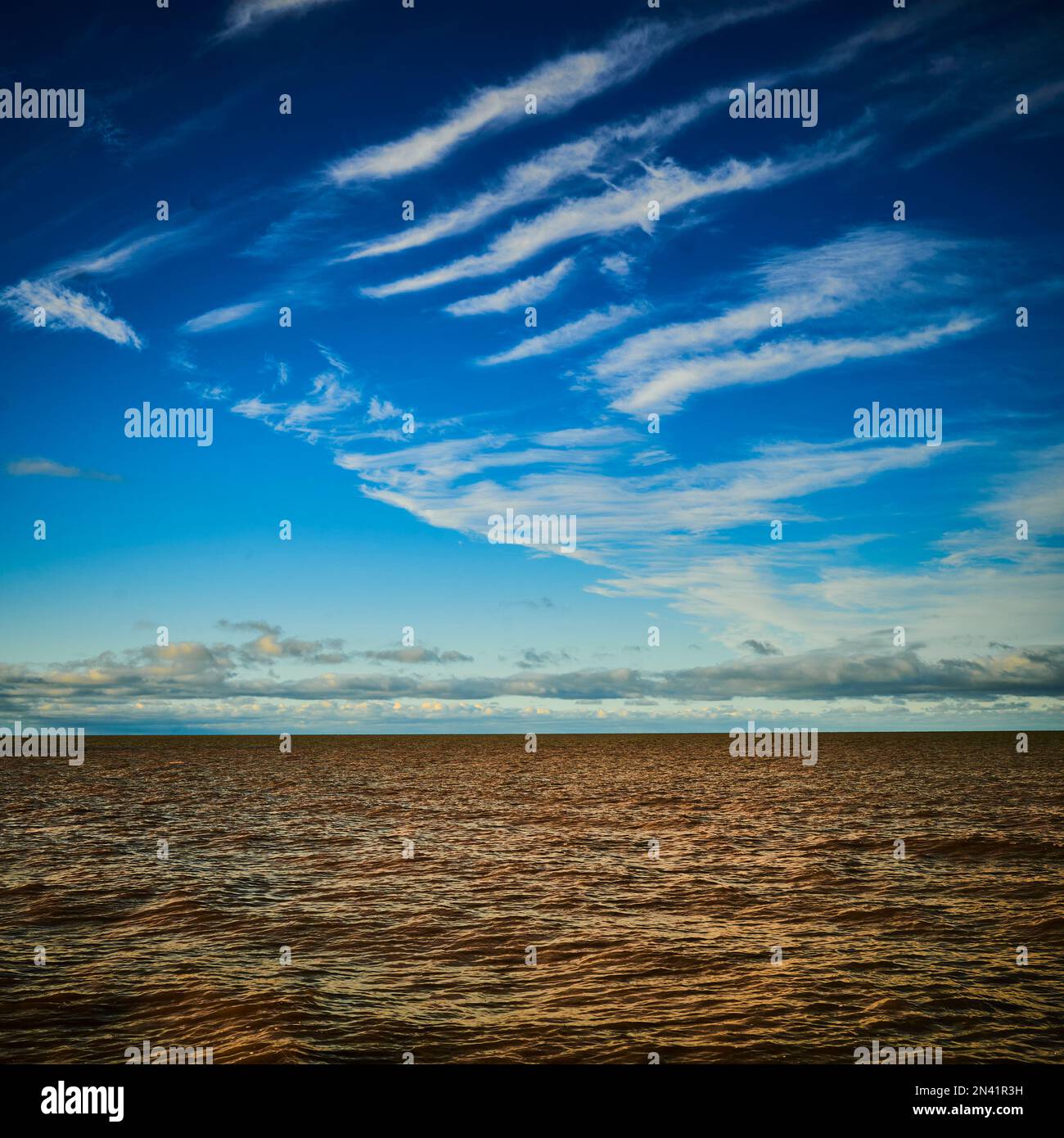 Wispy clouds hi-res stock photography and images - Alamy