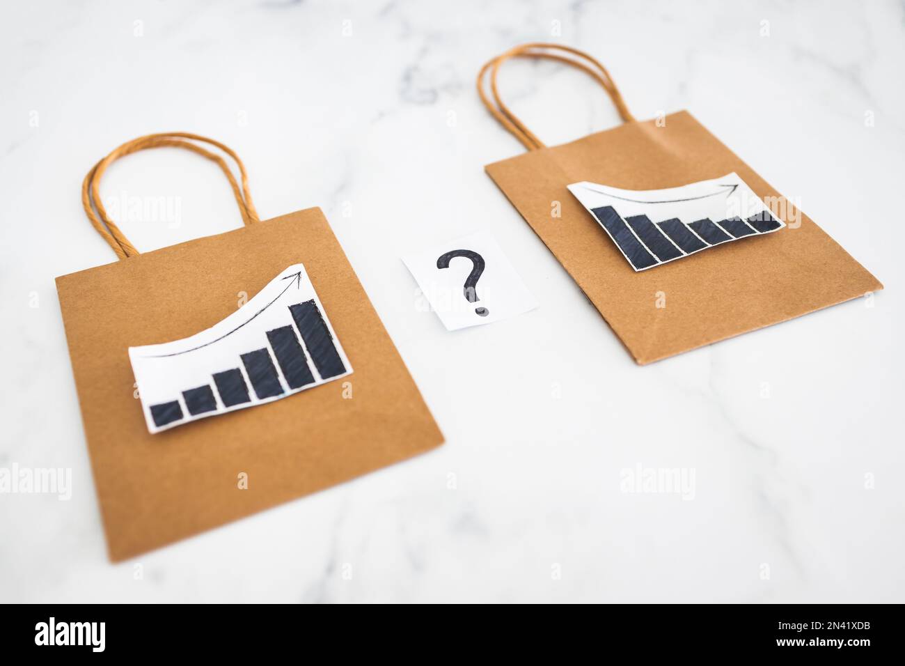 when will inflation go down. shopping bags with graph showing prices ...