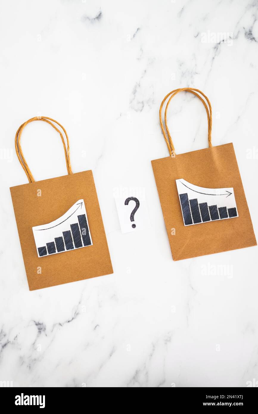 when will inflation go down. shopping bags with graph showing prices ...