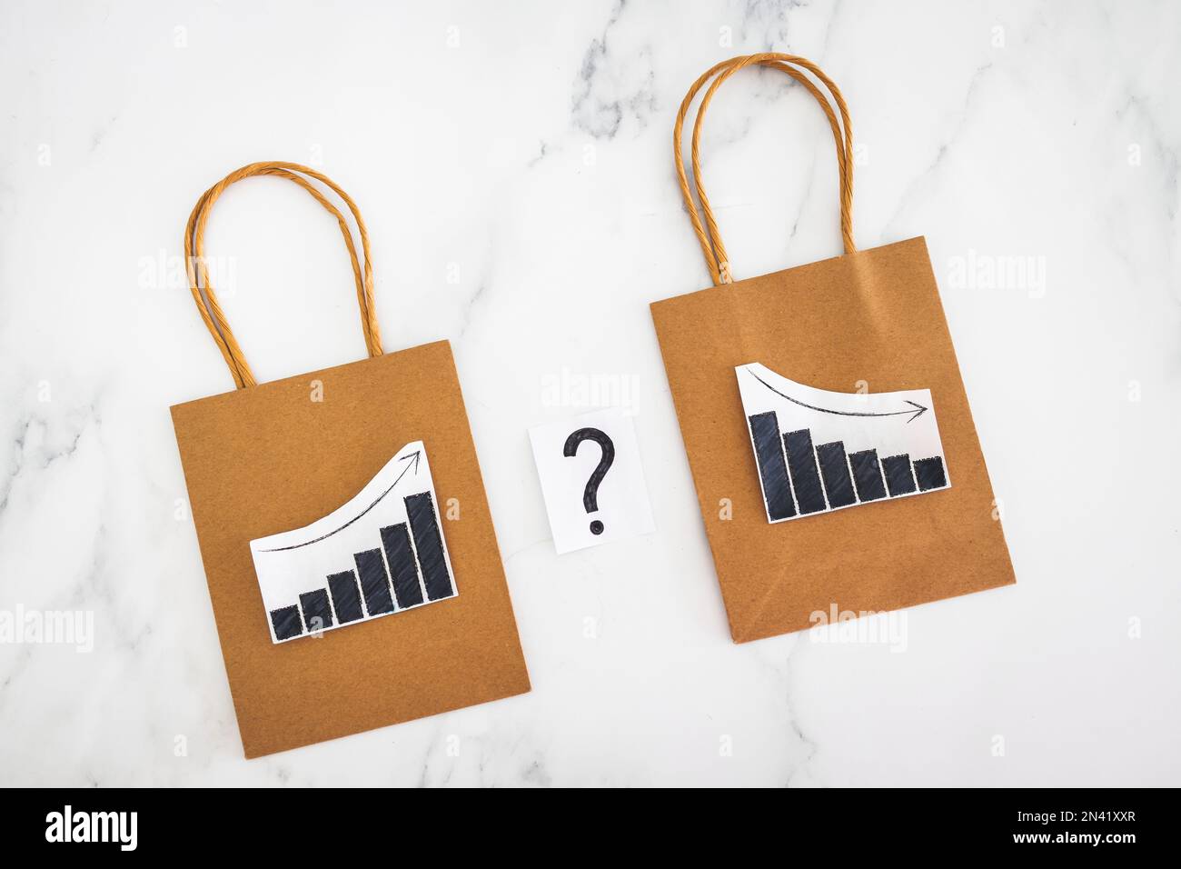 when will inflation go down. shopping bags with graph showing prices ...