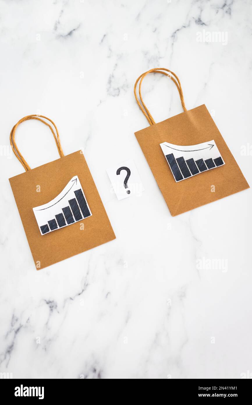 when will inflation go down. shopping bags with graph showing prices ...