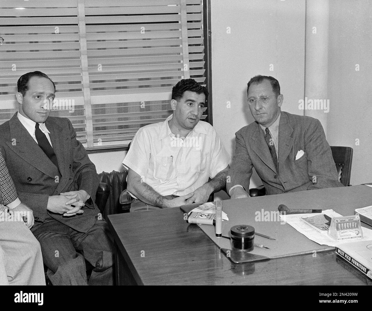 Al Tannenbaum, left, and Abe Reles, center, are shown as they were ...