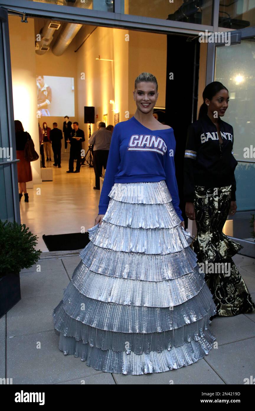 Models wearing the NFL Women's Apparel line pose at the NFL Hall of ...
