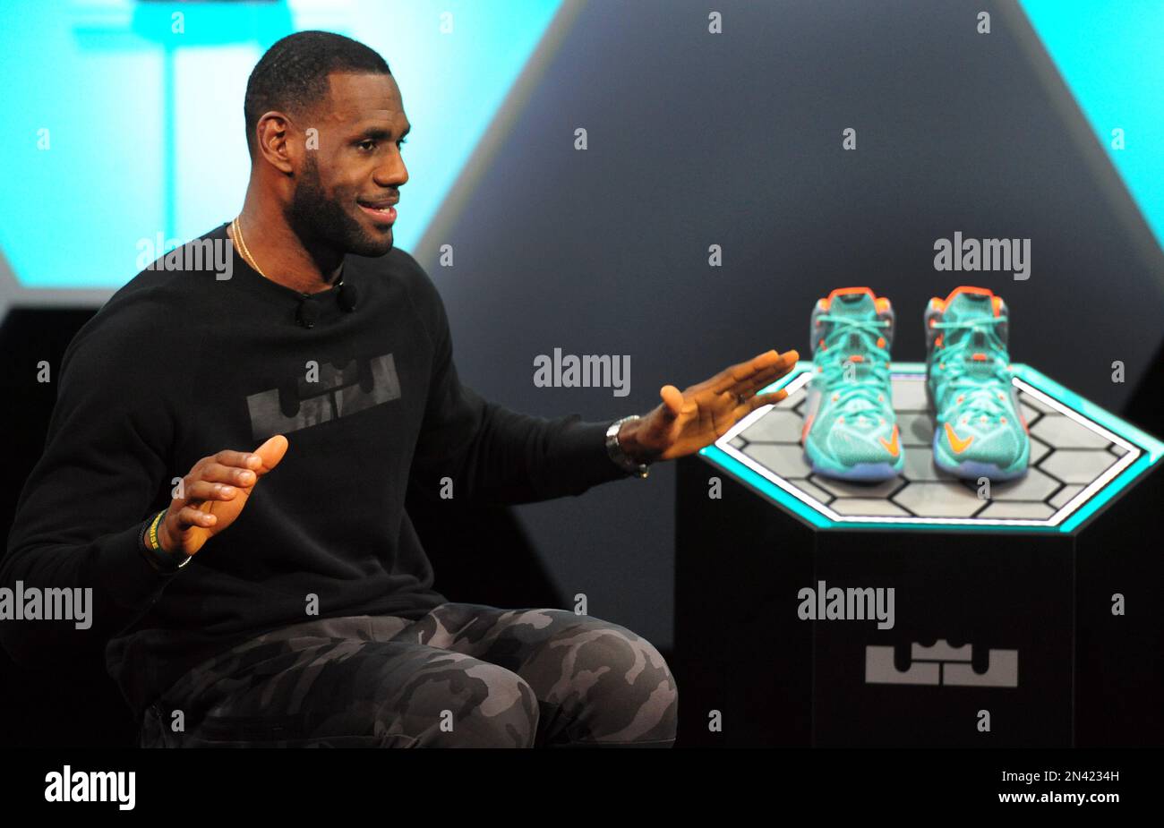 LeBron James speaks during the introduction of the LeBron 12 shoe the ...