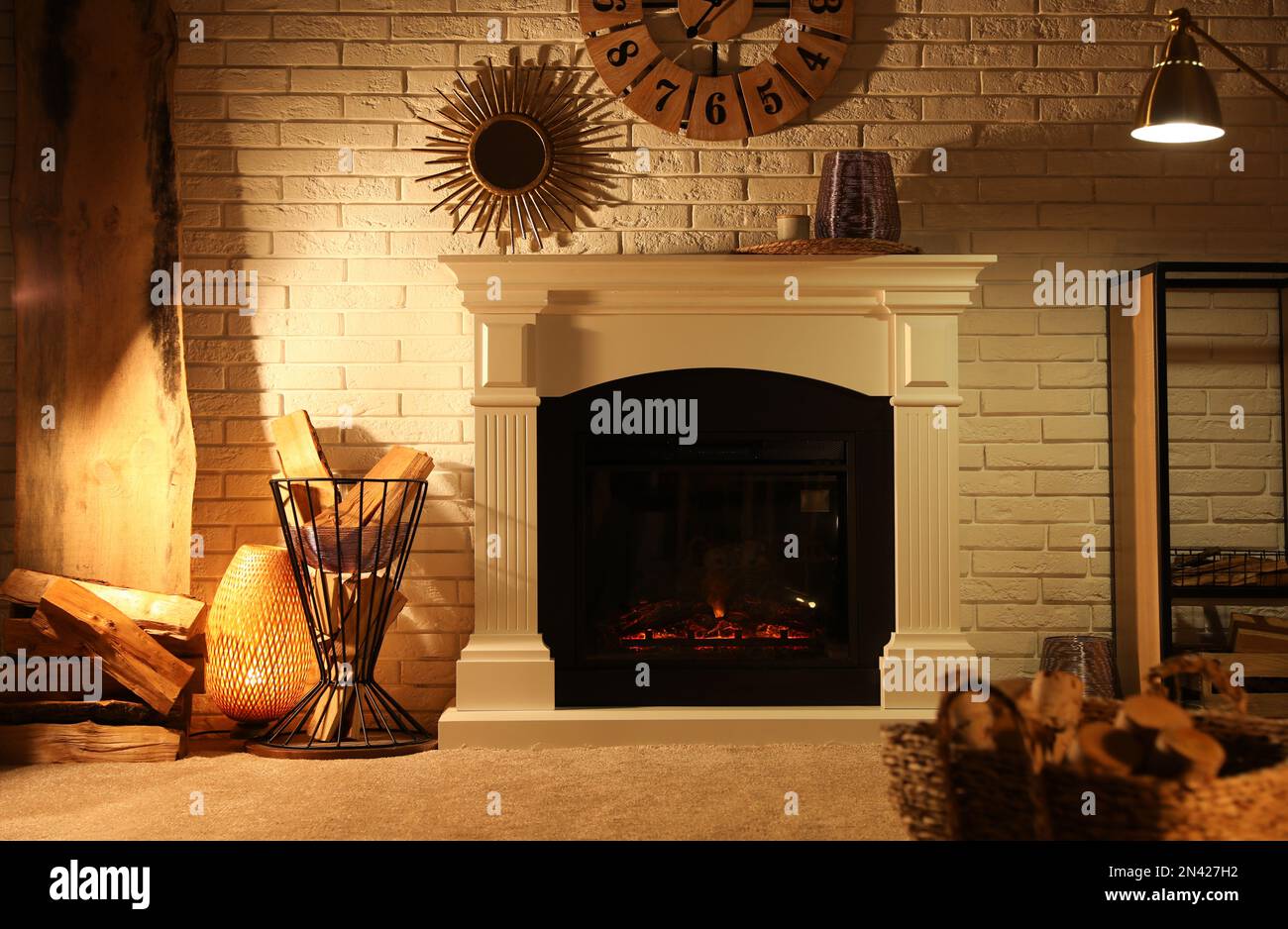 Fireplace and different decorations in living room. Interior design ...
