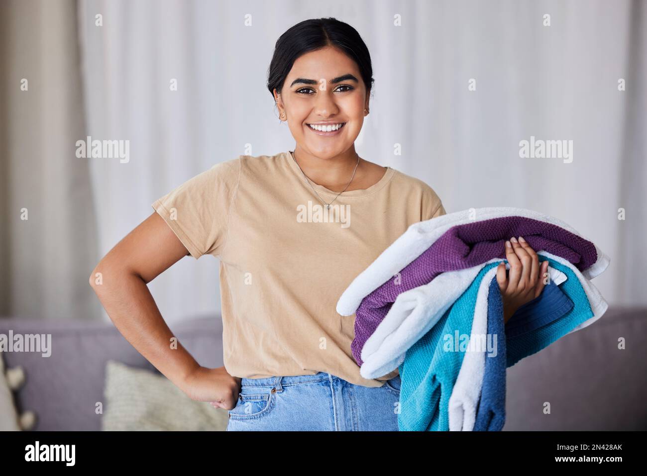 Portrait, woman and laundry with hygiene, spring cleaning service and ...