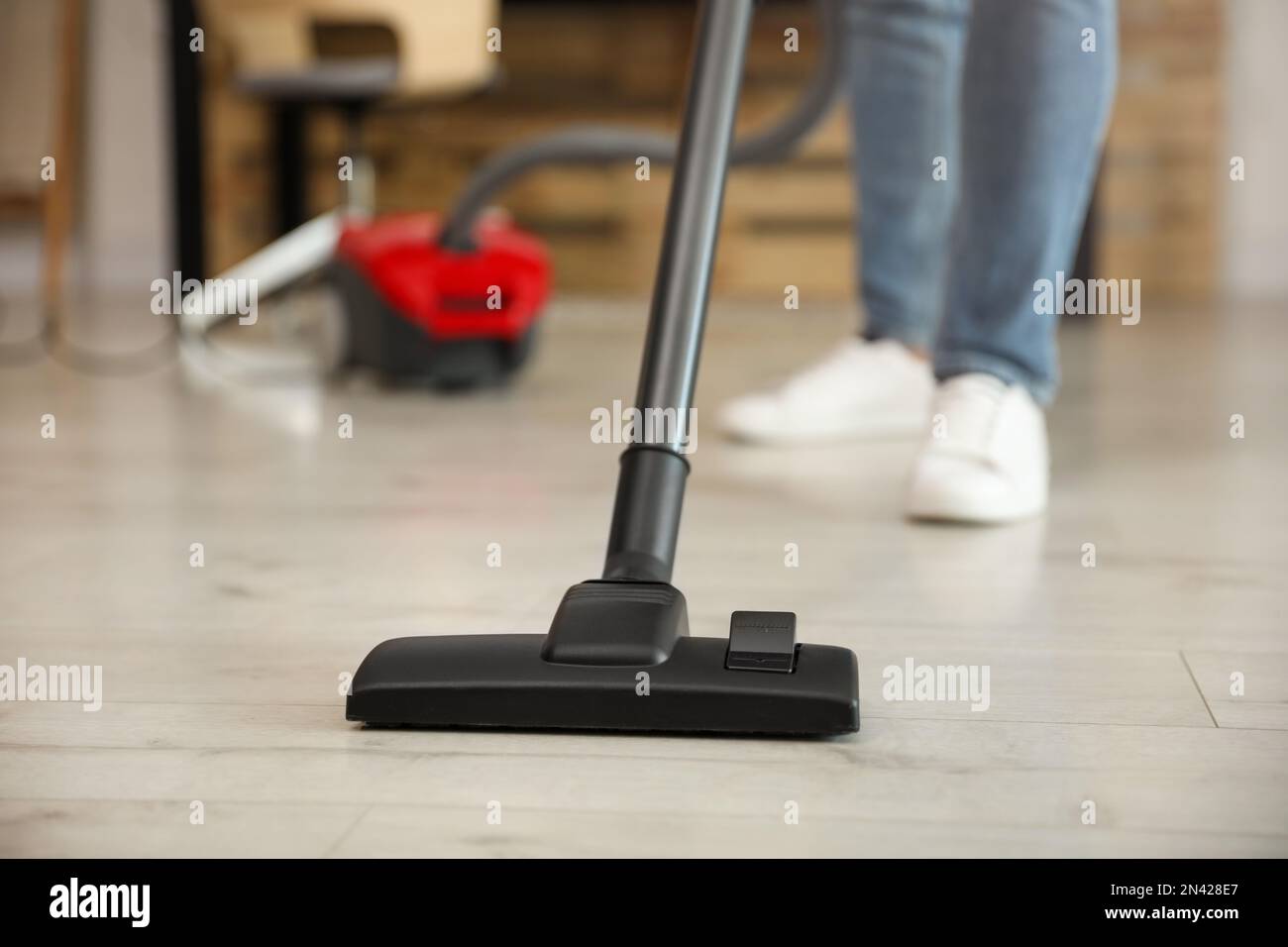 Adult male using vacuum cleaner hi-res stock photography and images - Alamy