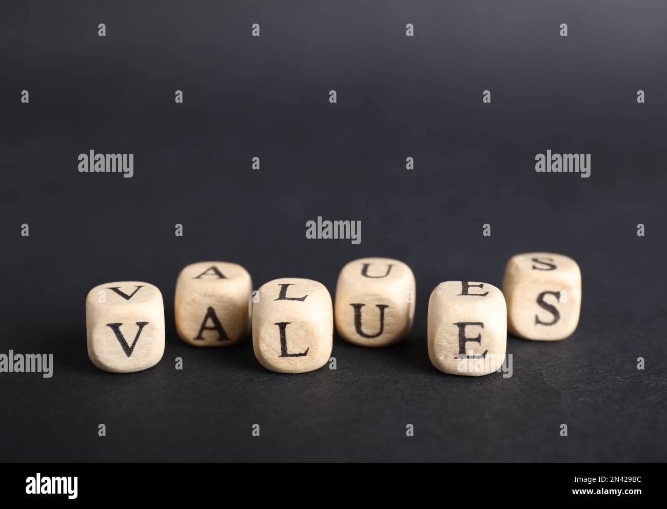Beads with word VALUES on black background Stock Photo - Alamy